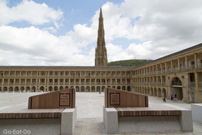 Seating in the redeveloped courtyard of the Piece Hall in Halifax ...