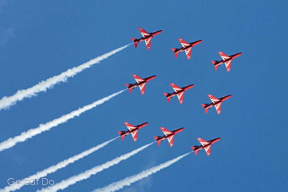 The Red Arrows flying in formation during an aerobatics display over ...