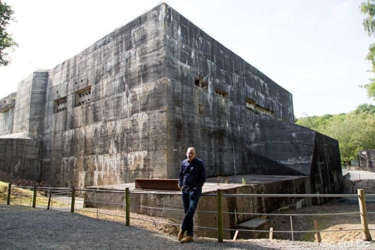 Travel writer and blogger Stuart Forster by the concrete bunker of the ...