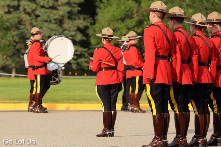 Mounties on parade. The acronym RCMP meaning Royal Canadian Mounted ...