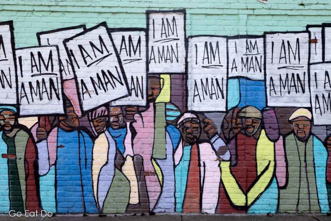 Street art in Memphis depicting an iconic moment of protest during the ...