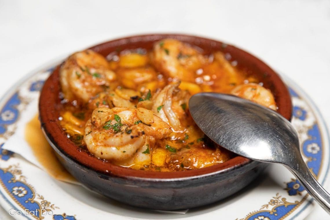 Spanish-style prawns in garlic, known as gambas al ajillo, served at ...